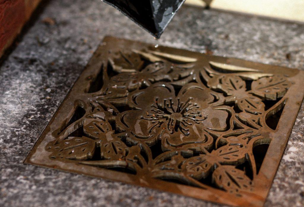 Decorative Rainwater Grates - Jonathan Lees Architects